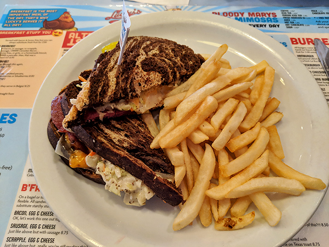 A sandwich that demands strategic eating plans. This multi-layered masterpiece requires both hands and possibly a brief nap afterward.