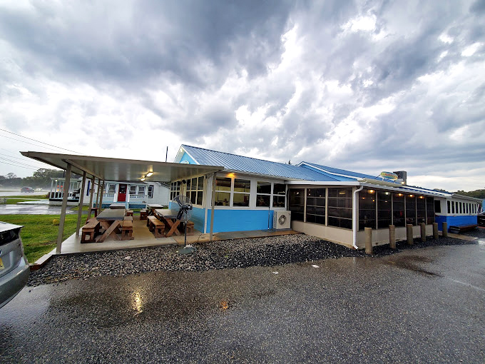 Even the sky seems to celebrate The Surfing Crab, providing dramatic clouds as the perfect backdrop for seafood adventures.