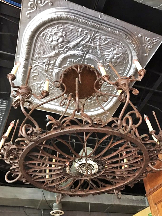 Even the lighting fixtures tell a story here&mdash;this vintage chandelier watches over countless first dates and family reunions sharing pancake balls below.