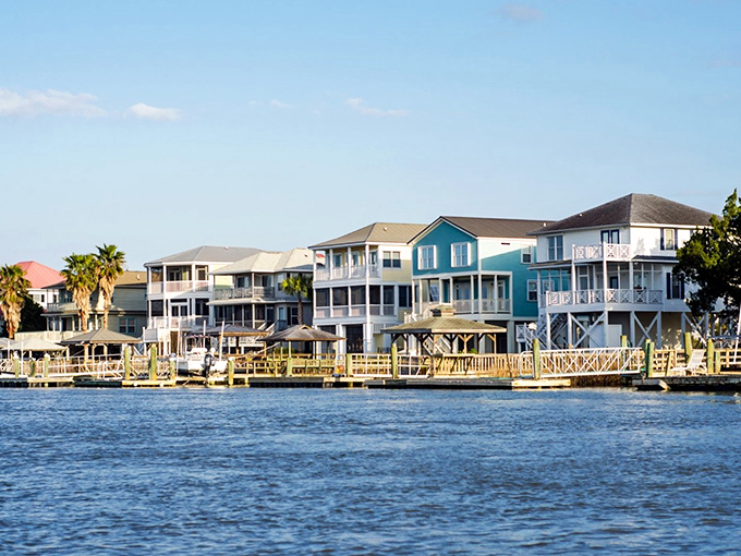 Edisto Beach homes stand in cheerful colors, greeting the Atlantic like a lineup of friendly locals welcoming visitors home.