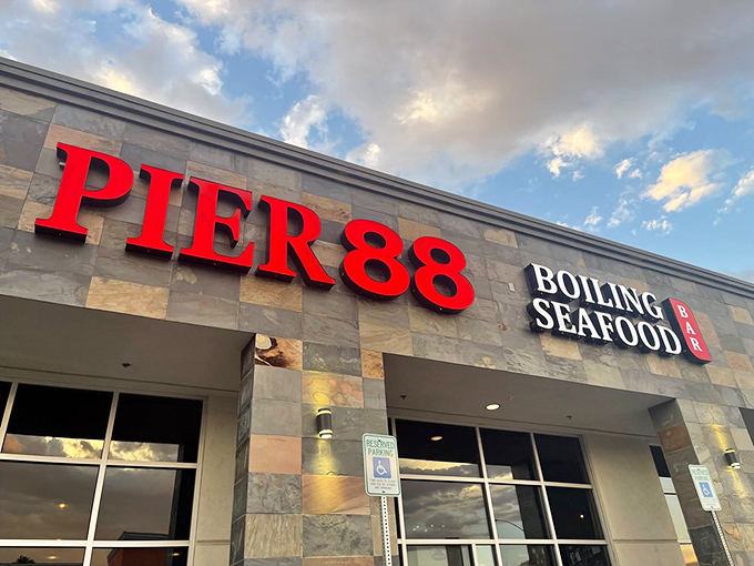 Pier 88's stone facade and bold red lettering signal serious seafood business inside. No ocean required for these amazing flavors!