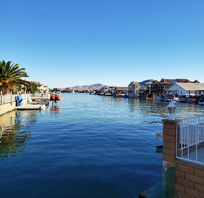 Waterfront homes with private docks create a seaside community where neighbors often arrive at dinner parties by boat instead of car.