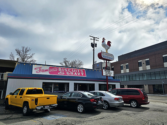 That rooster isn't just for show&mdash;it's crowing about legendary biscuits! The bright blue exterior practically shouts "morning happiness inside!"
