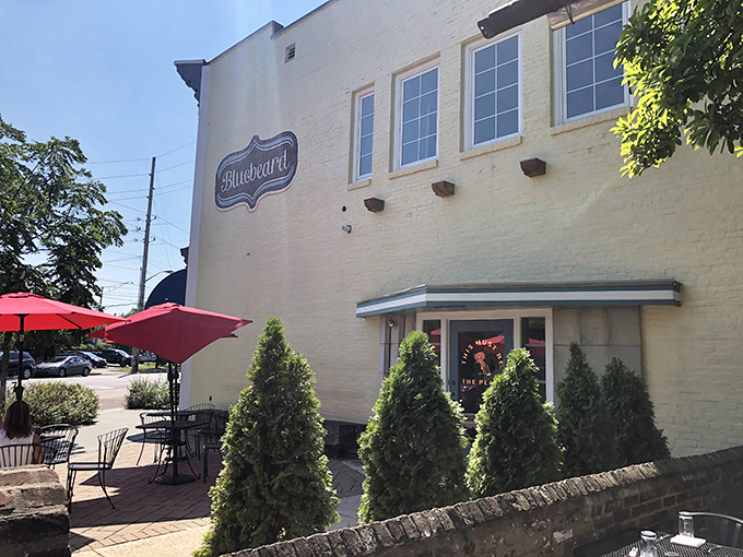 The charming outdoor seating area invites you to linger over coffee and conversation at this bookish culinary gem.