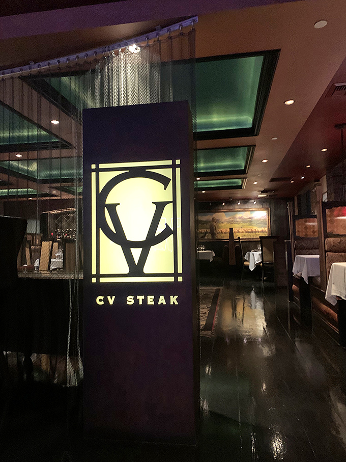 The sleek interior of CV Steak feels like the dining room of that friend who always makes you feel underdressed—but welcomes you anyway.