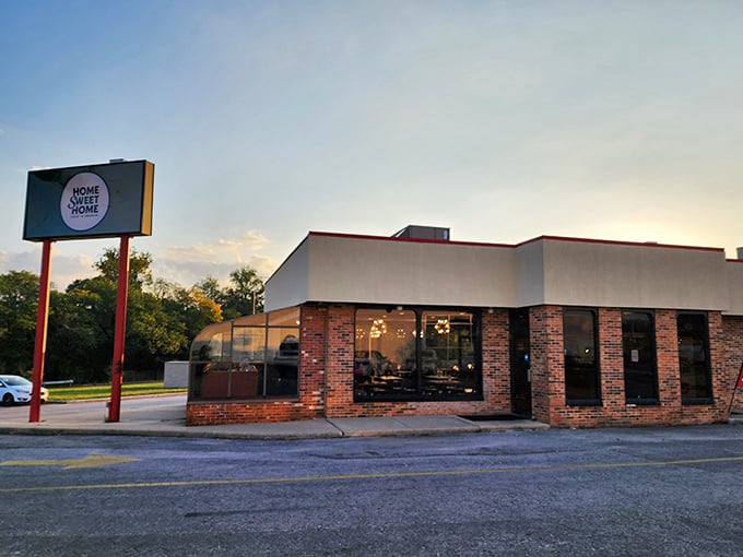 As the sun sets, this cozy corner spot glows with the promise of comfort food that doesn't need a filter to look good.