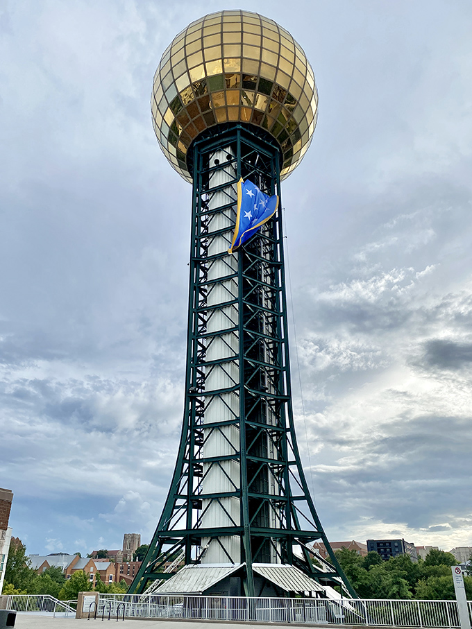 Knoxville's golden Sunsphere catches sunlight above the city. This World's Fair remnant towers over a city where your retirement dollars can actually reach new heights.