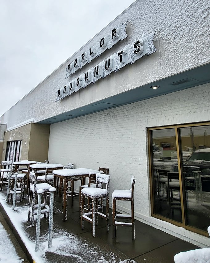 Parlor Doughnuts signage: Minimalist on the outside, maximalist on flavor. These layered creations deserve their architectural showcase.
