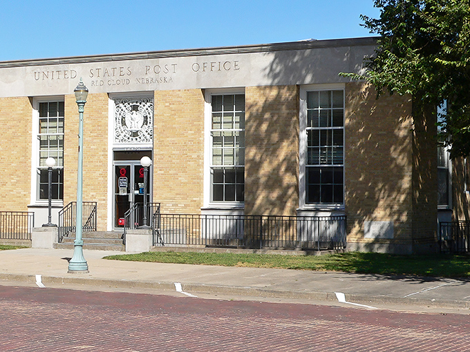 Red Cloud's historic post office represents the stability of a town where housing costs less than what some pay monthly for big city parking.