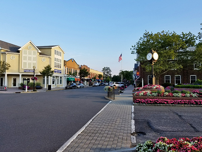 The town's flower displays burst with color, reflecting the vibrant community spirit that blooms year-round.