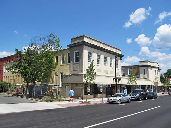Historic storefronts stand along Westfield's charming downtown, where historic buildings and blue skies create a picture-perfect small-city scene.