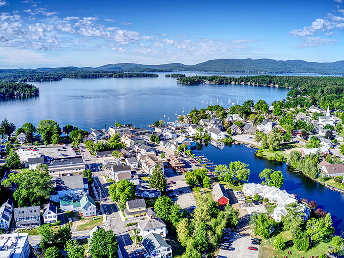 Fall in Wolfeboro transforms the town common into a carpet of crimson and gold around the iconic white church spire.
