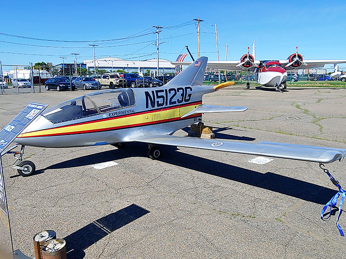 This streamlined experimental aircraft looks ready for takeoff, even while firmly planted on the tarmac. Its vibrant stripes practically scream "the future of yesterday."