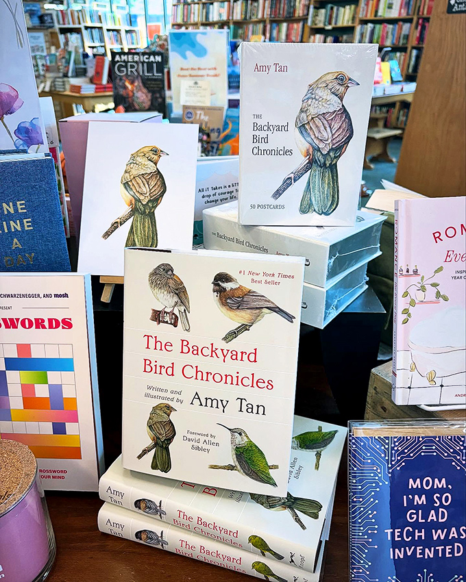 Amy Tan's bird illustrations prove some authors have unfair amounts of talent. The books are stacked like delicious literary pancakes waiting to be devoured.