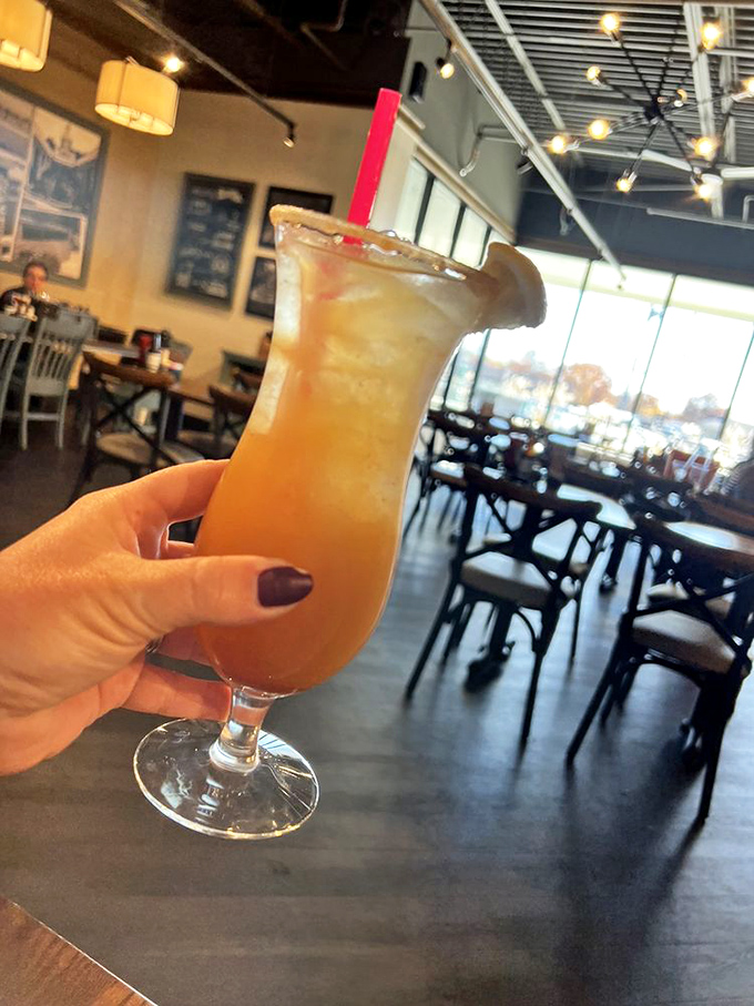 A hand-crafted cocktail catching the light just right—because sometimes breakfast deserves a splash of celebration beyond just coffee.