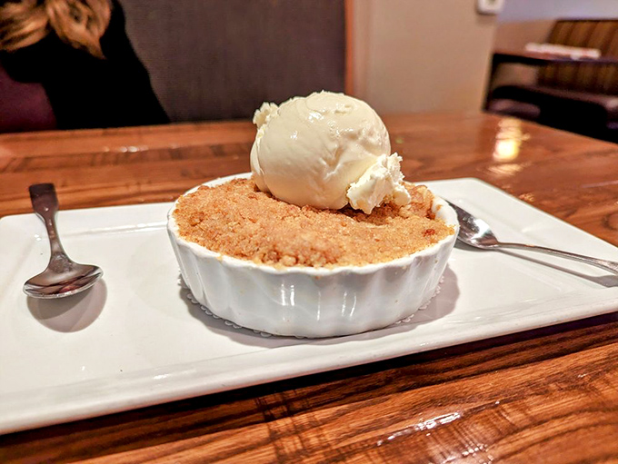 The apple crumble arrives still bubbling from the oven, topped with vanilla ice cream melting into all those nooks and crannies.