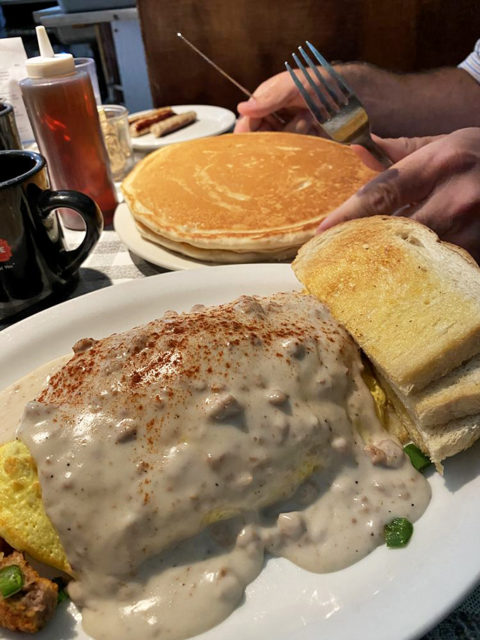 When gravy meets omelette, magic happens. This plate doesn't just say "good morning"&mdash;it belts it out like Aretha Franklin.