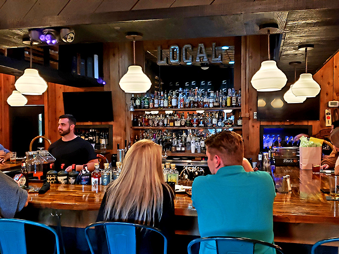 A bar stocked like a liquid library, where solutions to life's problems await in bottles tall and small. The bartender is both mixologist and therapist.