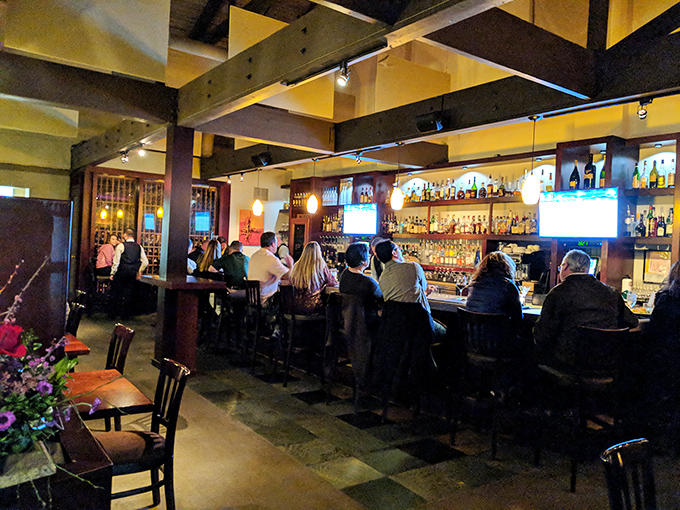 A bar stocked with enough spirits to raise yours, backed by bartenders who know the difference between shaken and stirred actually matters.