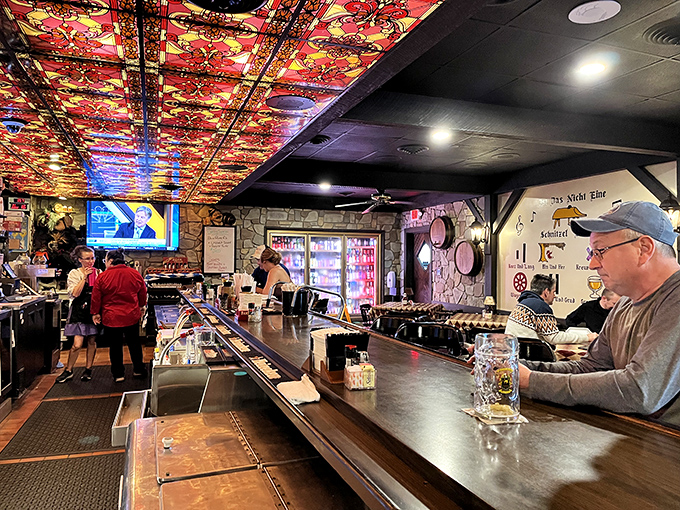 The bar's colorful ceiling isn't just eye-catching&mdash;it's a conversation starter. Many great friendships have begun under those lights with a "Prost!" and a clink.