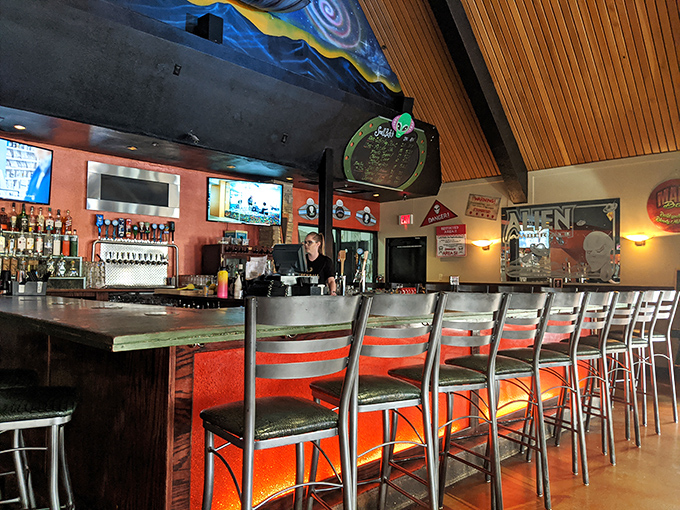 The bar isn't just where drinks are served &ndash; it's command central for this cosmic culinary adventure, with plenty of seating for solo travelers.