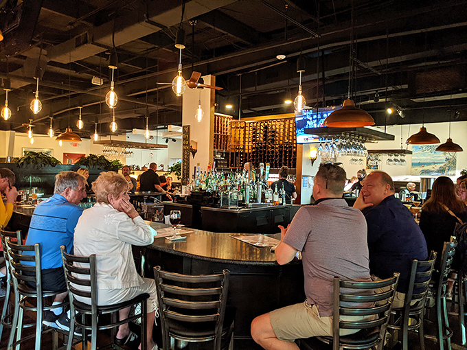 The bar area&mdash;where stories get better with each drink and nobody's checking their phone because actual human connection is happening.