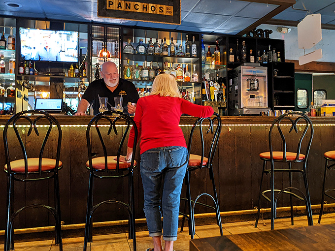 A bartender who knows the difference between pouring a drink and crafting a memory. This is where Connecticut unwinds.