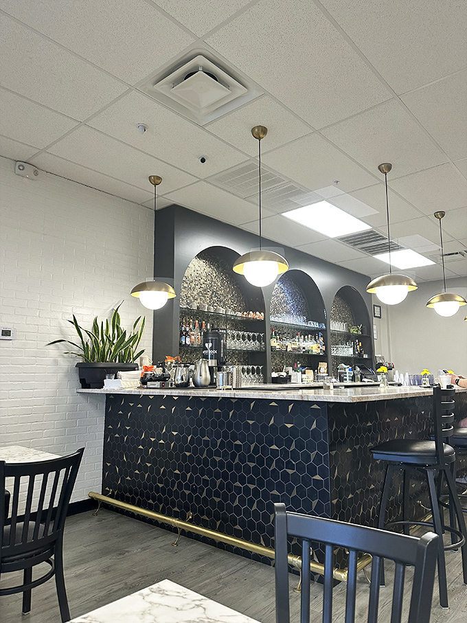 Even the bar area maintains that perfect balance between casual and special – like your favorite aunt's dining room, if she were a culinary genius.