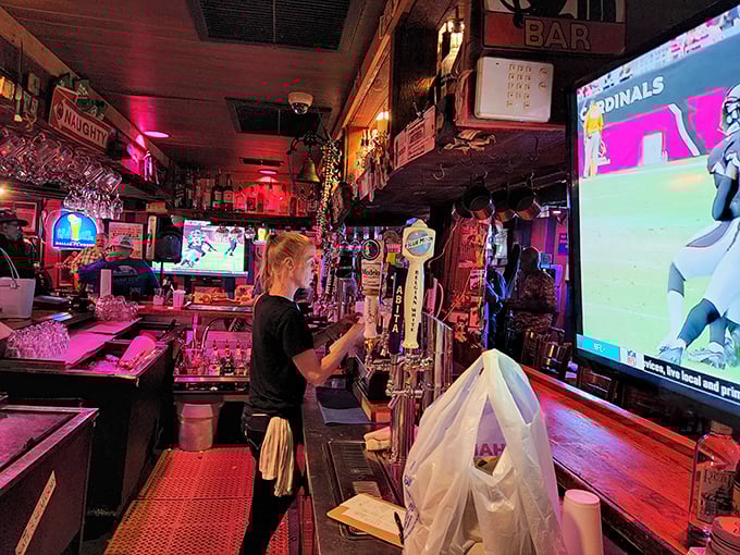 Sports on the screens, spirits on the shelves. The bar area offers liquid courage before tackling those intimidating crab legs.