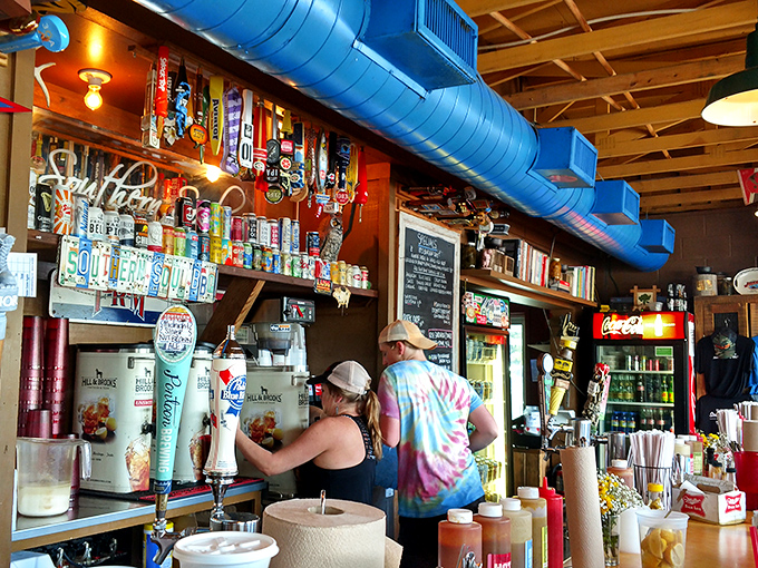 The bar area&mdash;where BBQ dreams and cold beer dreams come together in perfect harmony. Those taps are dispensing liquid happiness.