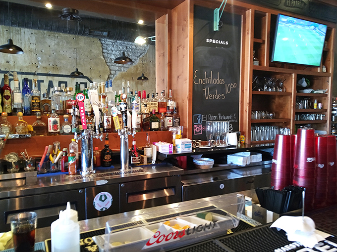 A bar that means business with enough tequila bottles to form a small army. The chalkboard specials hint at seasonal surprises worth investigating.
