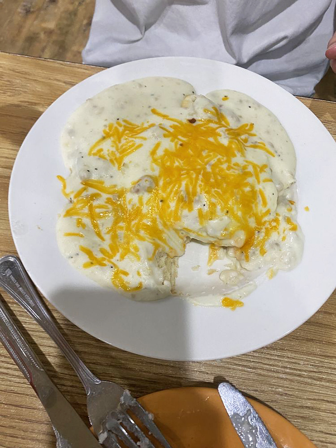 Cloud-like biscuits swimming in creamy gravy heaven. This Southern classic gets the Nevada treatment with a generous sprinkle of cheese.