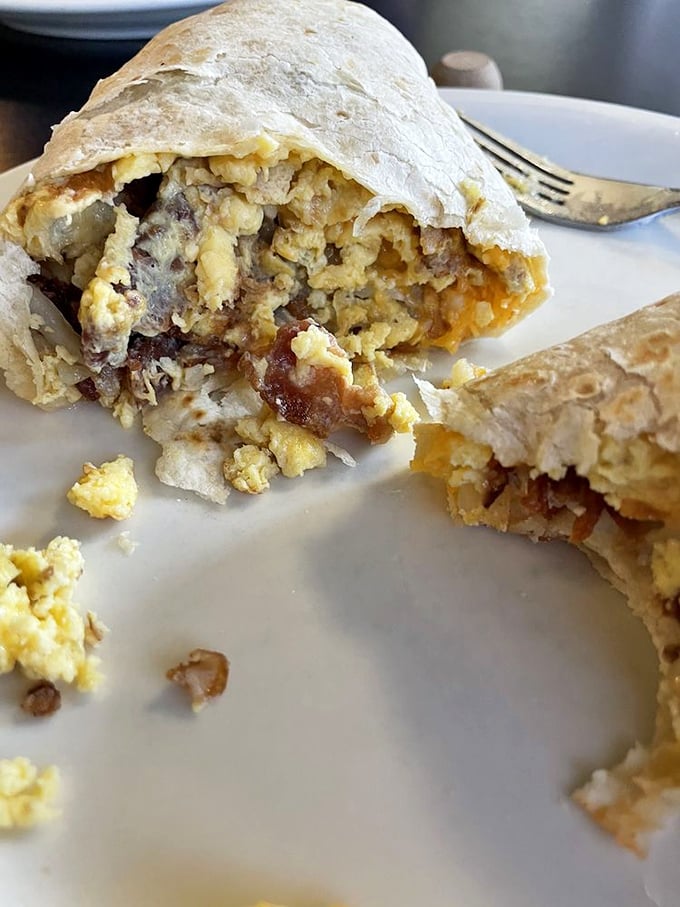 The breakfast burrito&mdash;mankind's greatest contribution to portable morning meals&mdash;cut open to reveal its glorious, egg-filled interior.