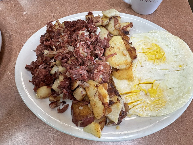 A plate that honors the sacred breakfast trinity&mdash;eggs, potatoes, and corned beef hash. The kind of meal that makes you rethink brunch elsewhere.
