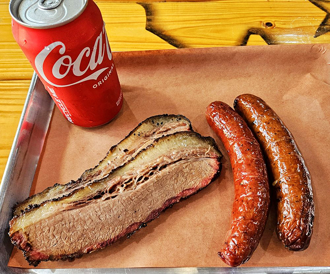 Brisket with that jiggle that makes barbecue enthusiasts weak in the knees, paired with sausages sporting that perfect snap when bitten.