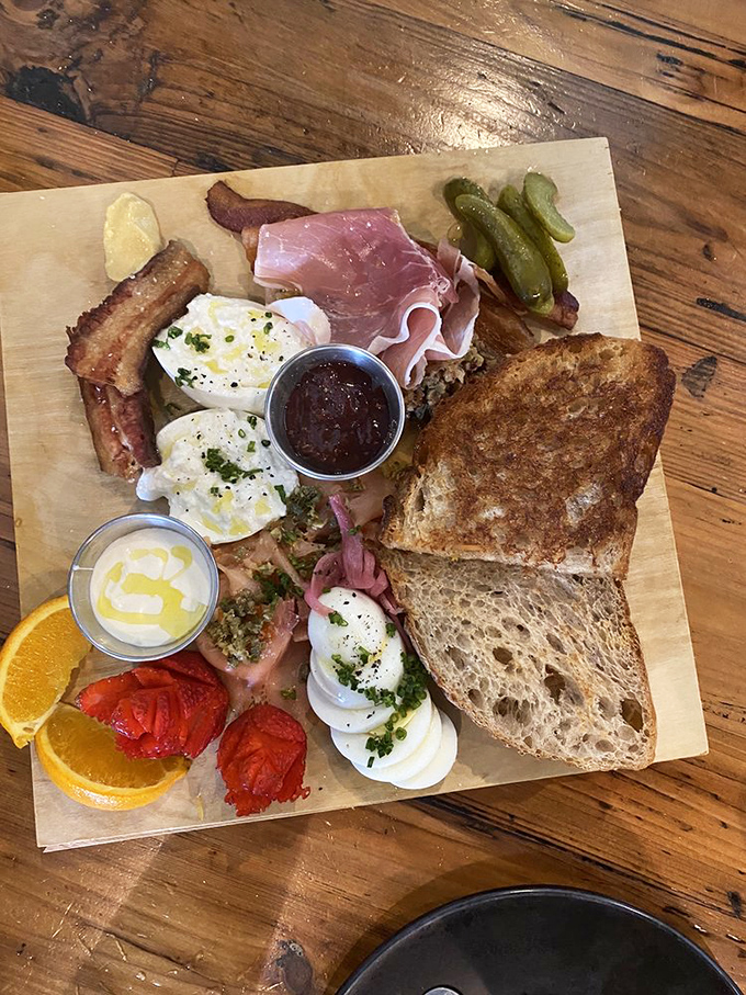 A breakfast board that belongs in the Louvre&mdash;poached eggs, artisanal toast, and jam that makes you question why you ever settled for Smucker's.