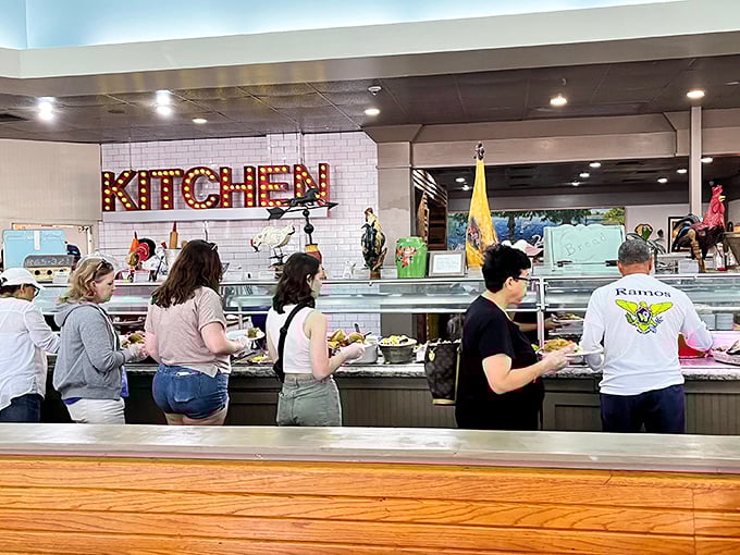 The "KITCHEN" sign lights up like Broadway, and rightfully so&mdash;this is where the magic happens. The buffet line moves with practiced efficiency.