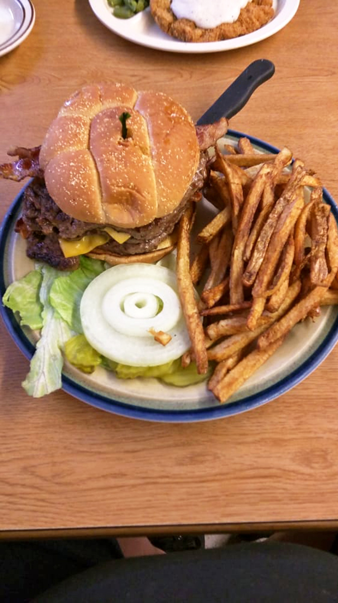A burger built like a Midwestern linebacker &ndash; substantial, no-nonsense, and impossible to ignore. Those hand-cut fries deserve their own fan club.
