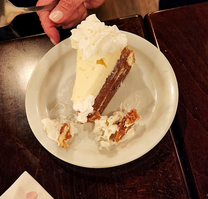 Carrot cake that's living its best life with cream cheese frosting so generous it's practically philanthropy on a plate.