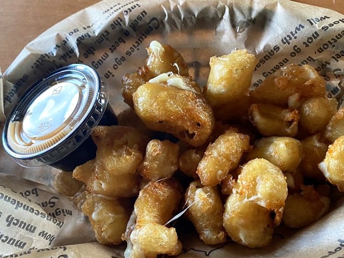 These cheese curds aren't just fried, they're transformed – golden nuggets of joy with a side of creamy dipping sauce.