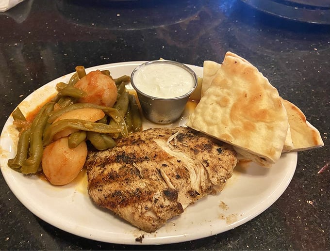 Simple yet spectacular&mdash;grilled chicken, green beans, and rice with a side of pita. Sometimes the straightforward approach wins the flavor race.
