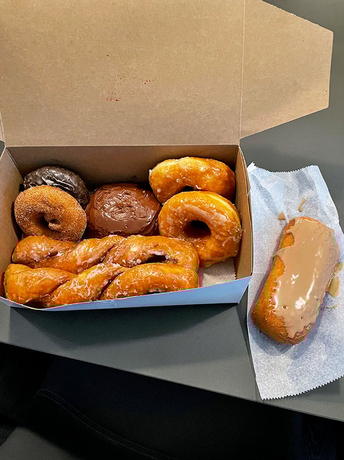 Three amigos of fried dough bliss. That glazed twist in the middle has the perfect chew-to-sugar ratio that haunts donut dreams.