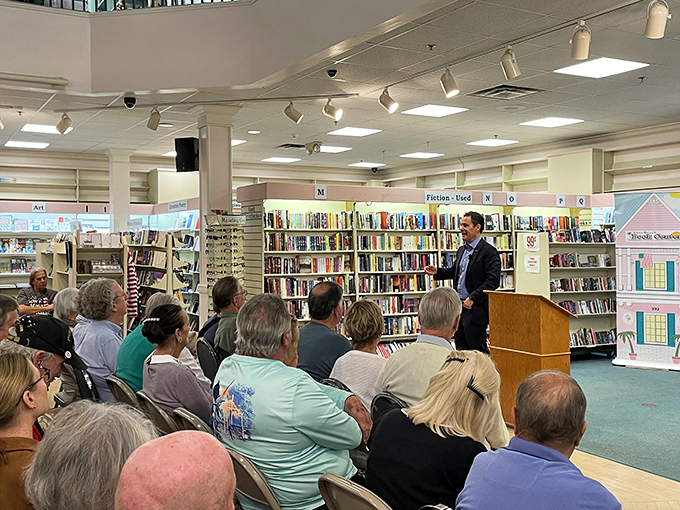 Author events transform quiet aisles into community gathering spaces, where readers connect with the minds behind their favorite worlds.