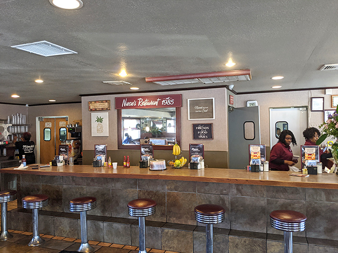 The counter view reveals the heart of Niecie's operation. Like watching a well-choreographed dance, the staff moves with purpose while keeping coffee cups filled.