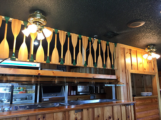 Wooden paddles line the serving counter, a nautical touch that reminds you this place takes its "fisherman" theme seriously without going overboard.