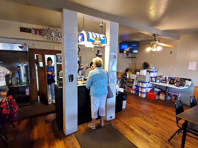 The beating heart of Mary's operation – where orders are called, tickets are hung, and chicken fried dreams become reality.