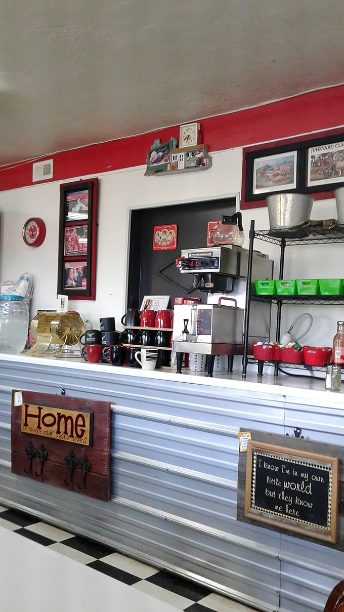 That sign says it all: "They know me here." In a world of anonymity, this counter offers the comfort of recognition and red coffee mugs.