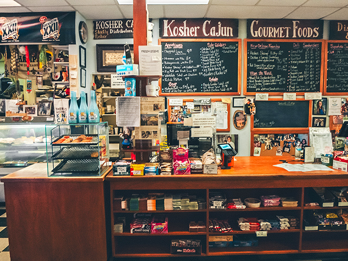 The heart of operations, where deli dreams come true. Chalkboard menus and packed display cases promise delicious possibilities around every corner.