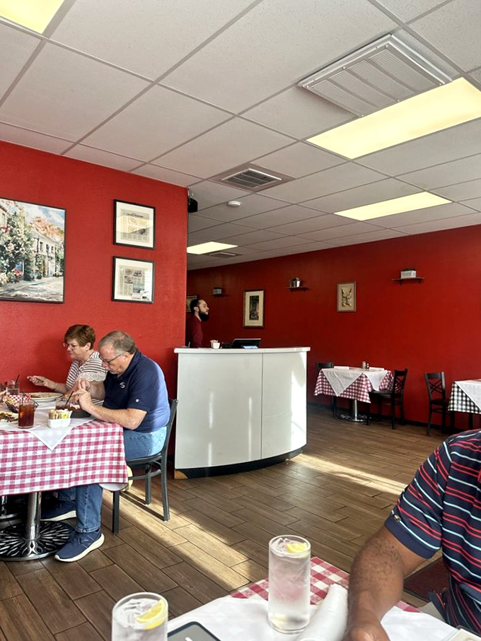 The heart of the operation&mdash;where culinary magic happens behind a simple white counter that belies the complexity of flavors it serves.