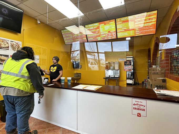 The ordering counter&mdash;that magical threshold where wishes become dishes. Like Aladdin's lamp, but with better culinary outcomes.